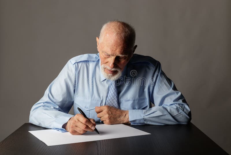 Old man is writing stock photo. Image of beard, concentration - 164894456