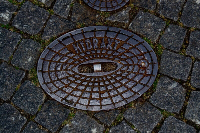 Old Manhole in the City with the Inscription Editorial Stock Photo ...