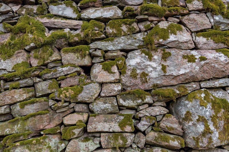 An Old Manmade Stone Wall with Moss on it Stock Image - Image of green ...