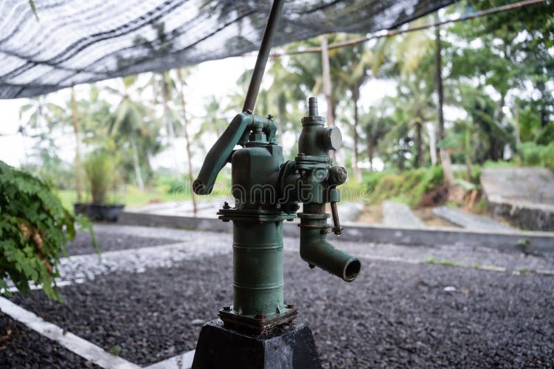 Old Manual Water Pump. Vintage Cast Iron Water Pump with Handle for ...