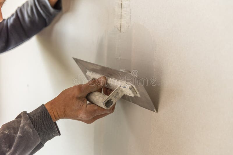 Old Manual Worker with Wall Plastering Tools Renovating House Stock ...