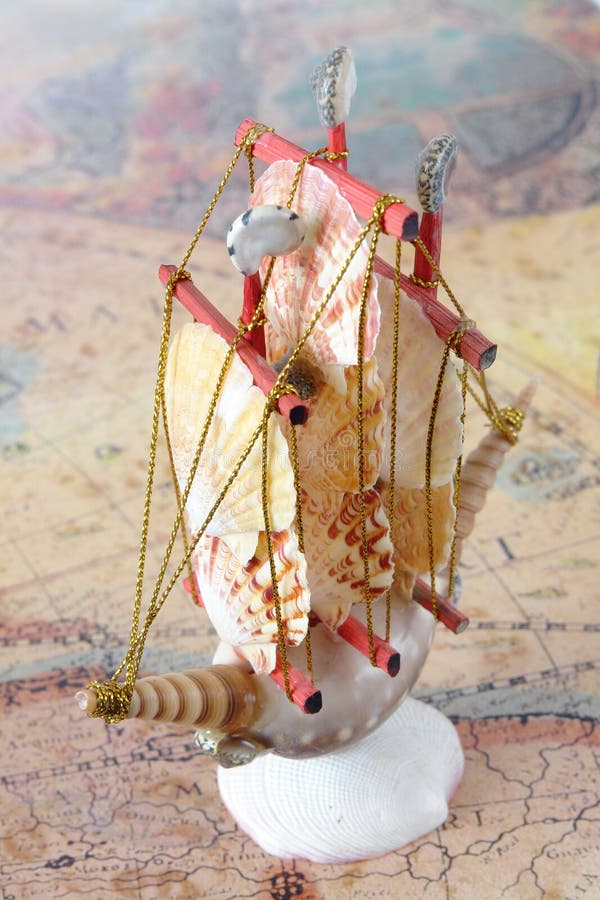 Old map and sea shell ship stock image. Image of boat - 4164107