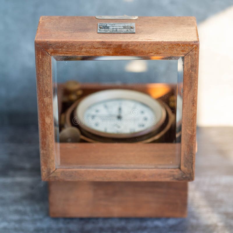 An Old Marine Chronometer in a Wooden Case Stock Photo - Image of ...