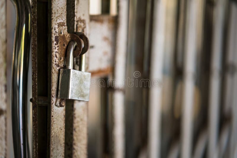 Old Master Key Locked on Iron Gate, Steel Padlock, Close Up Selective ...