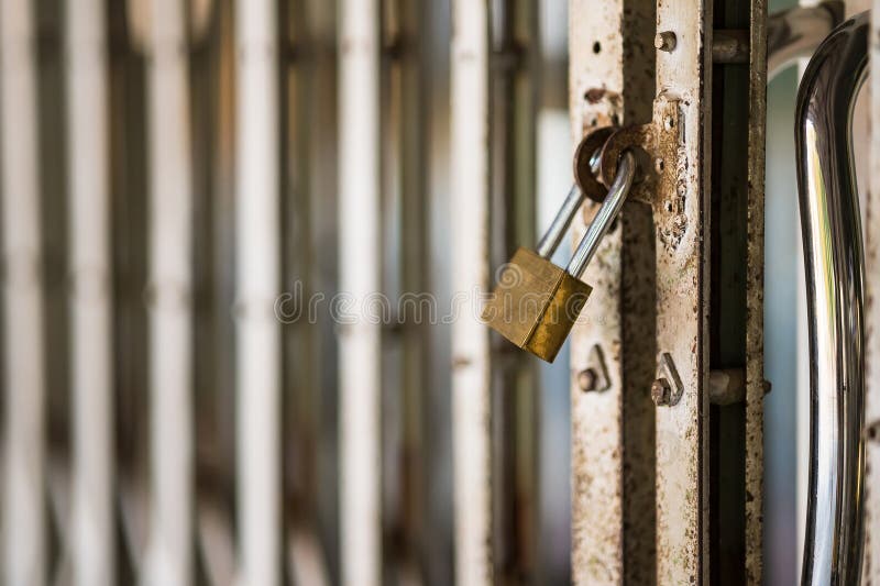 Old Master Key Locked on Iron Gate, Steel Padlock, Close Up Selective ...