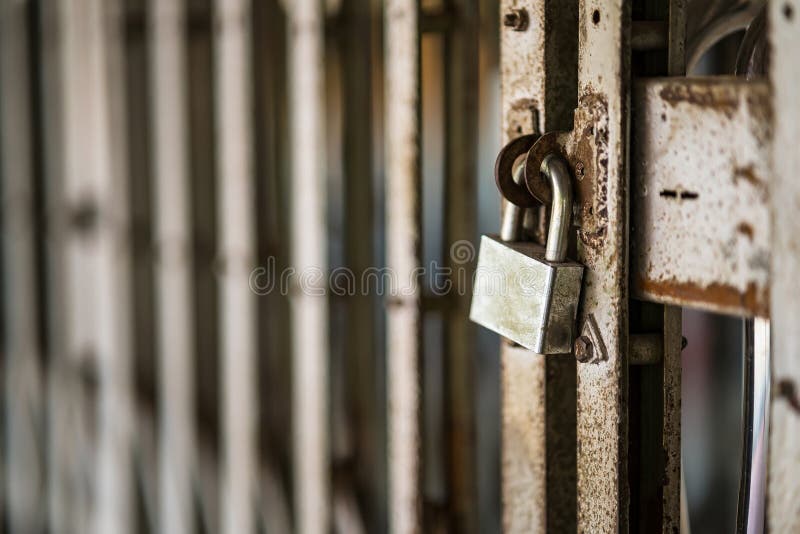 Old Master Key Locked on Iron Gate, Steel Padlock, Close Up Selective ...