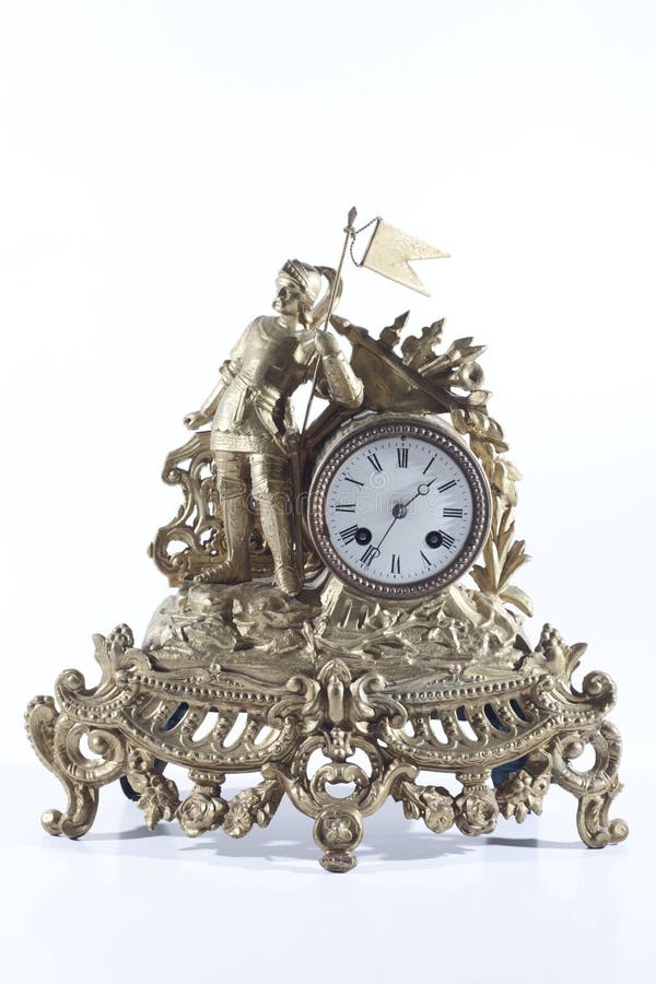 Old Mechanical Fireplace Clock with the Knight Stock Photo - Image of ...