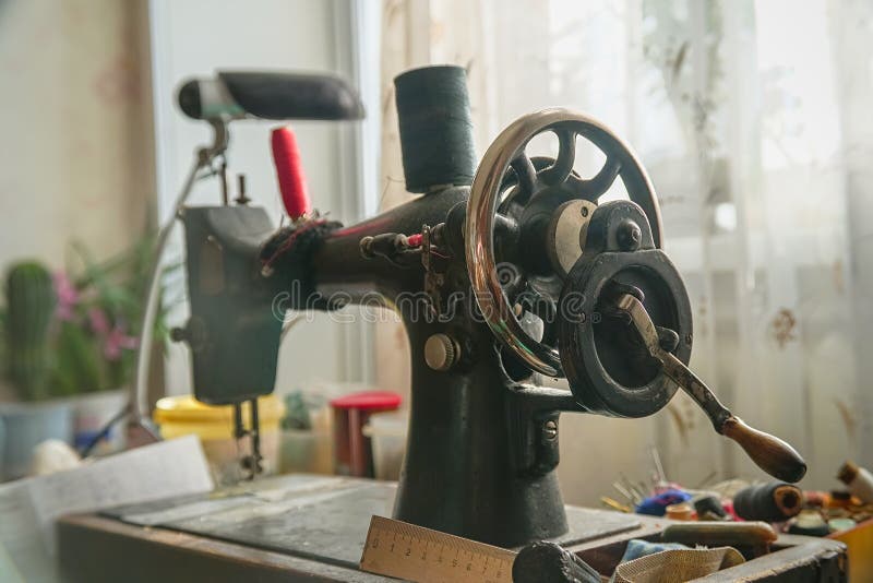 Old Mechanical Sewing Machine on Table Stock Photo - Image of ...