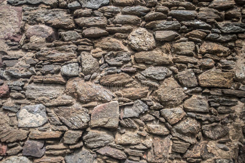 Old Dark Stone Wall Built of Different Stones, Texture, Pattern ...