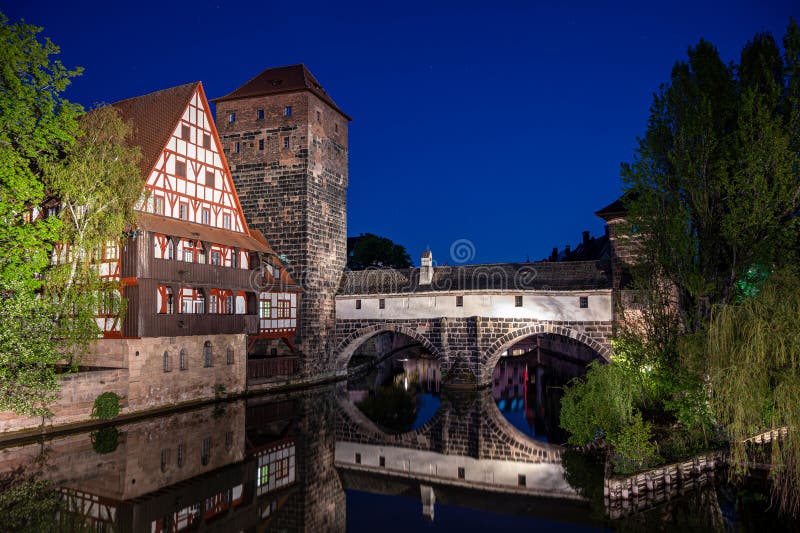 Old Medieval Bridge at Night Over Pegnitz River in Nuremberg, Germany ...