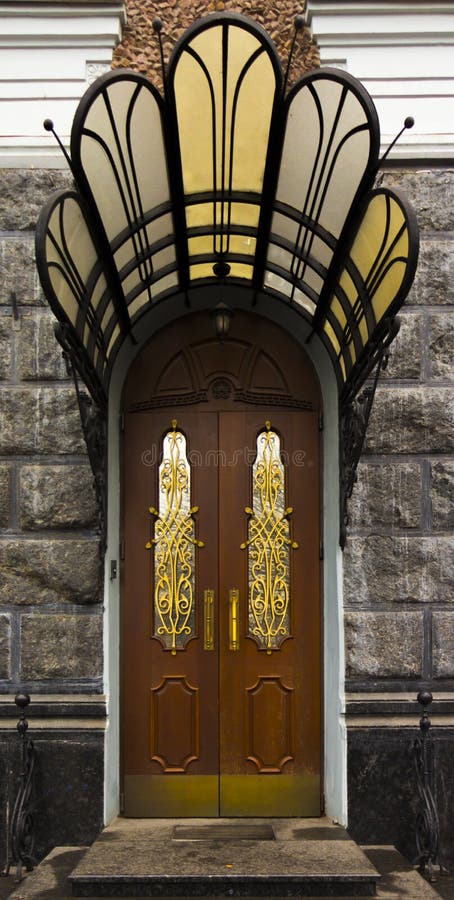 An Old Medieval Wooden Door with a Studded Forged Iron Frame Stock ...