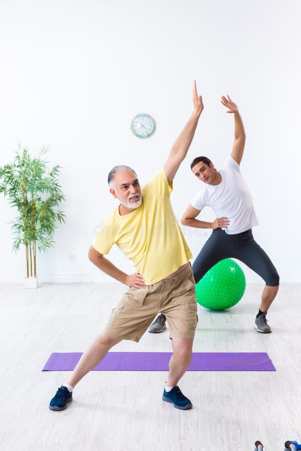 Old Man Doing Exercises Indoors Stock Photo - Image of keeping ...