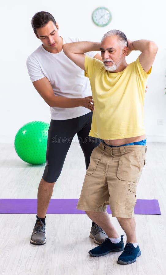 Old Man Doing Exercises Indoors Stock Image - Image of explaining ...