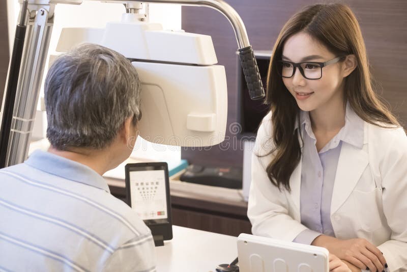 Old man with optometrist stock image. Image of clinic - 99859677