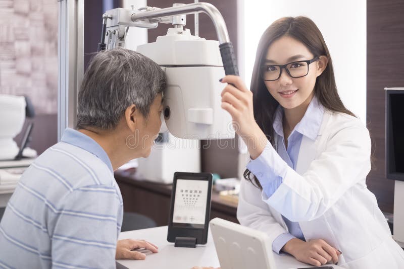 Old man with optometrist stock photo. Image of medical - 100238608