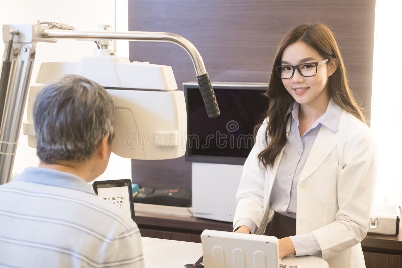 Old man with optometrist stock photo. Image of medicine - 99230558