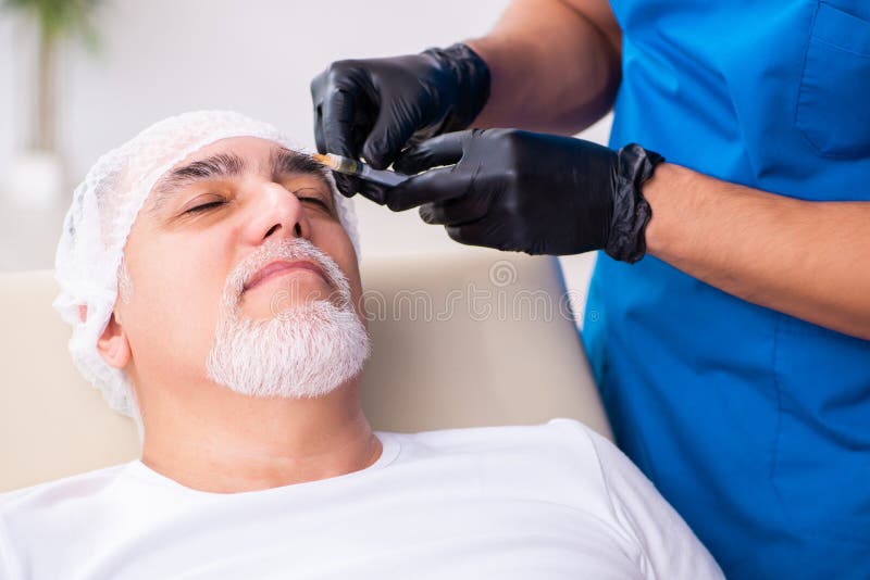 Old Man Visiting Male Doctor for Plastic Surgery Stock Photo - Image of ...