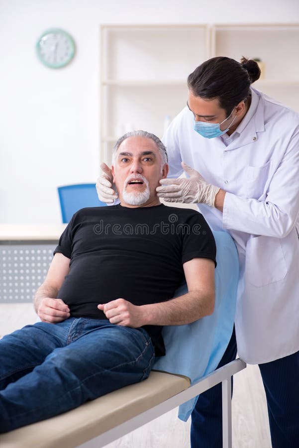 Old Man Visiting Young Doctor for Plastic Surgery Stock Photo - Image ...