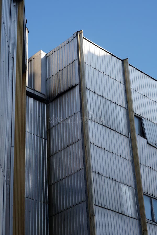 Metal building stock photo. Image of clouds, distressed - 116257432