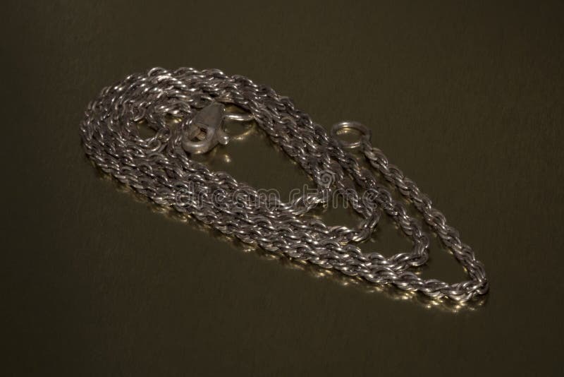 Old Metal Chain on a Metal Surface. Stock Photo - Image of elegant ...