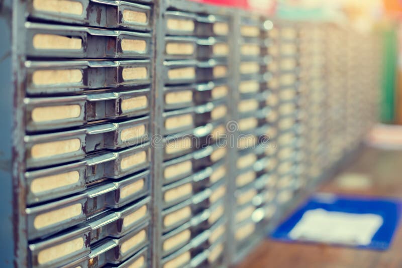 Old Metal File Cabinet. Manual Control Product System in Old Warehouse ...