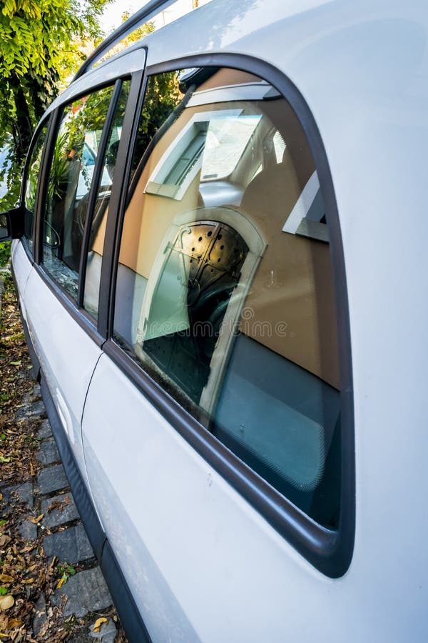 Reflection of a Building in a Car Window. Stock Image - Image of orange ...