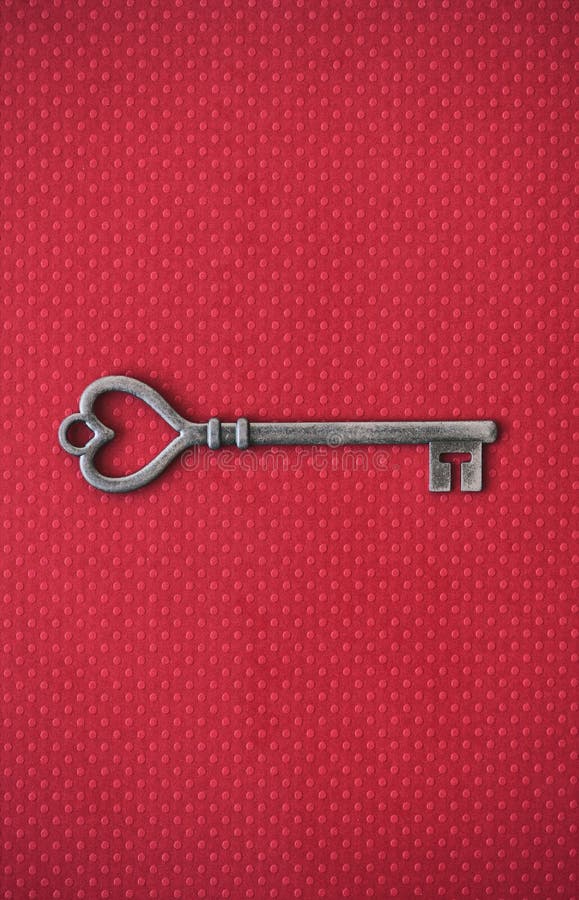 Old Metal Heart Shaped Key on Red Background Stock Photo - Image of ...