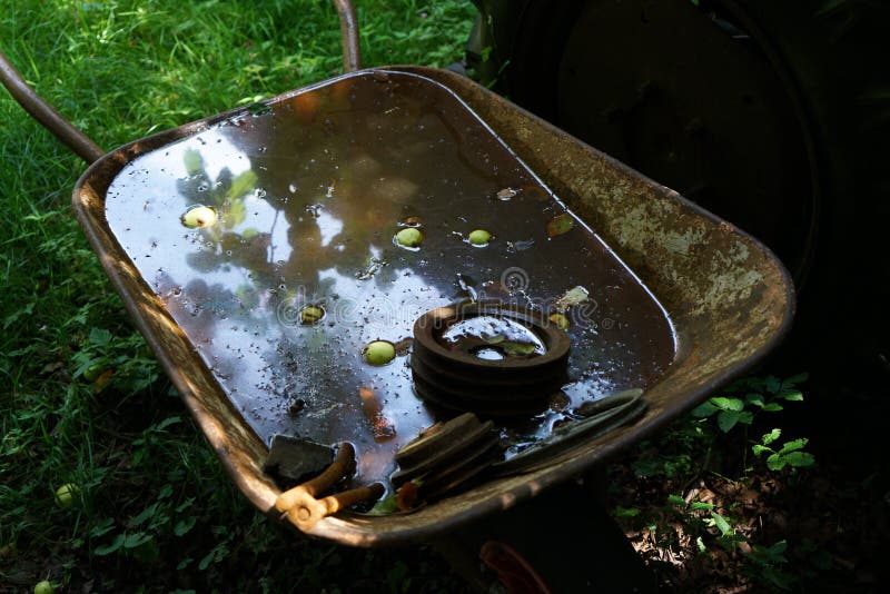 Old Metal Junk in the Dirty Water Stock Photo - Image of miscellaneous ...