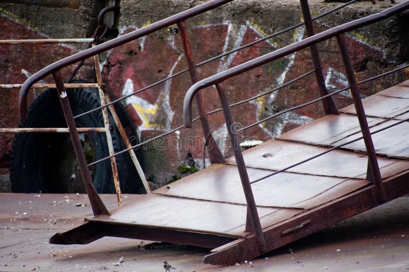 An Old Metal Ladder with Handrails Installed on the Quay Stock Photo ...