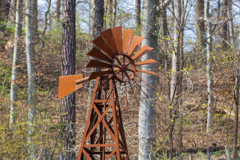 Old Metal Rusty Pinwheel Near the Forest Stock Image - Image of metal ...