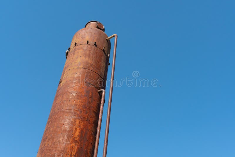 An Old Metal Rusty Water Tower. Old Production Technology, Processing ...