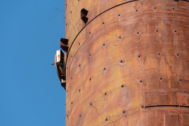 An Old Metal Rusty Water Tower. Old Production Technology, Processing ...