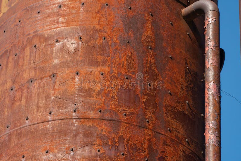 An Old Metal Rusty Water Tower. Old Production Technology, Processing ...