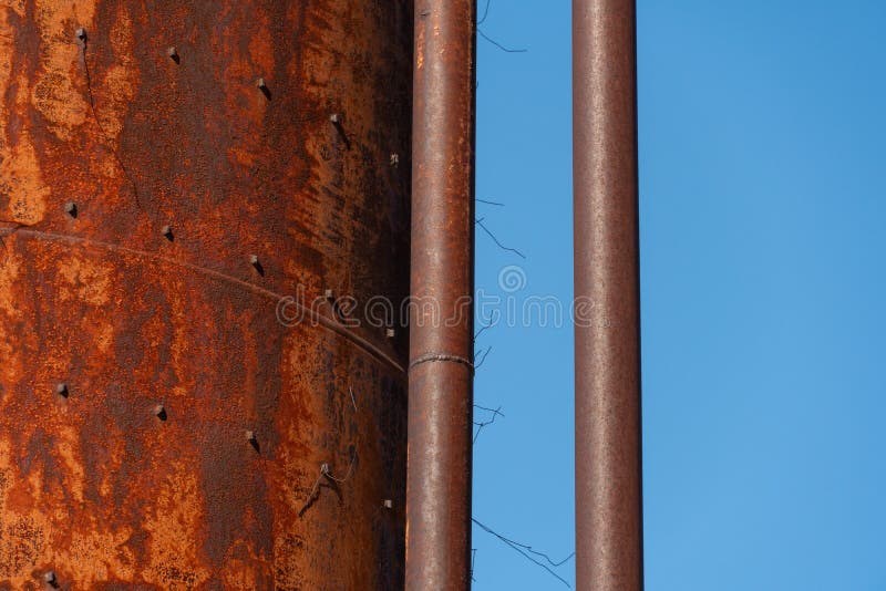 An Old Metal Rusty Water Tower. Old Production Technology, Processing ...
