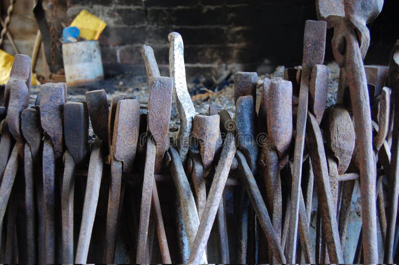 Old metal tools at forge stock image. Image of heat, tool - 28869603