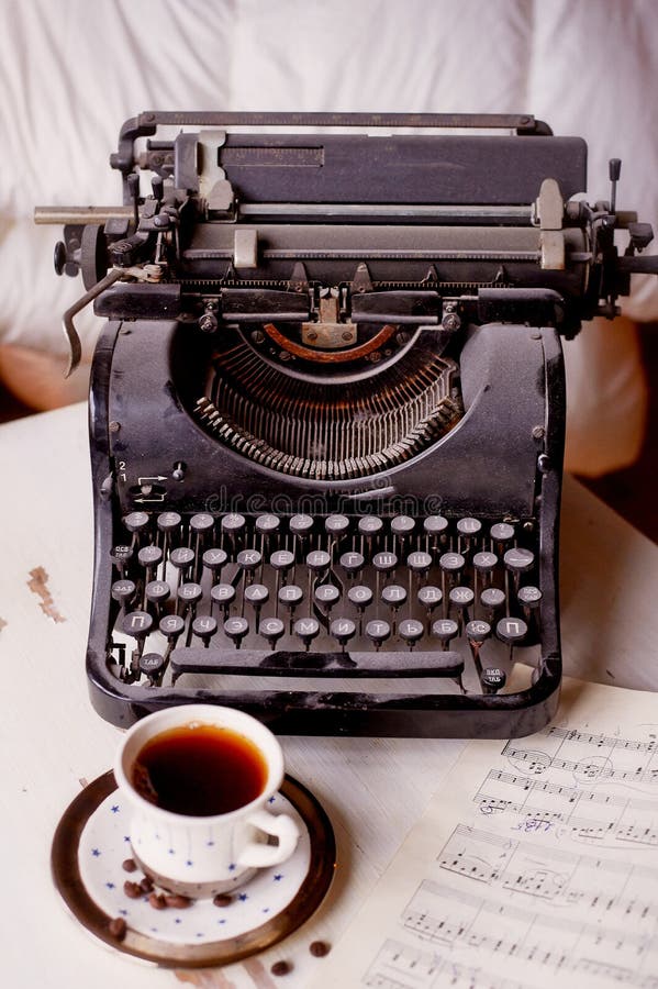 Old Metal Typewriter, Covered in Dust and Rust.Cup of Coffee on the ...