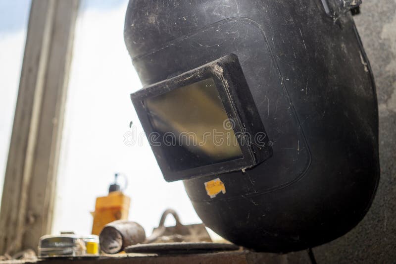 Old Metal Workers Face Visor Hanging on a Wall Stock Image - Image of ...