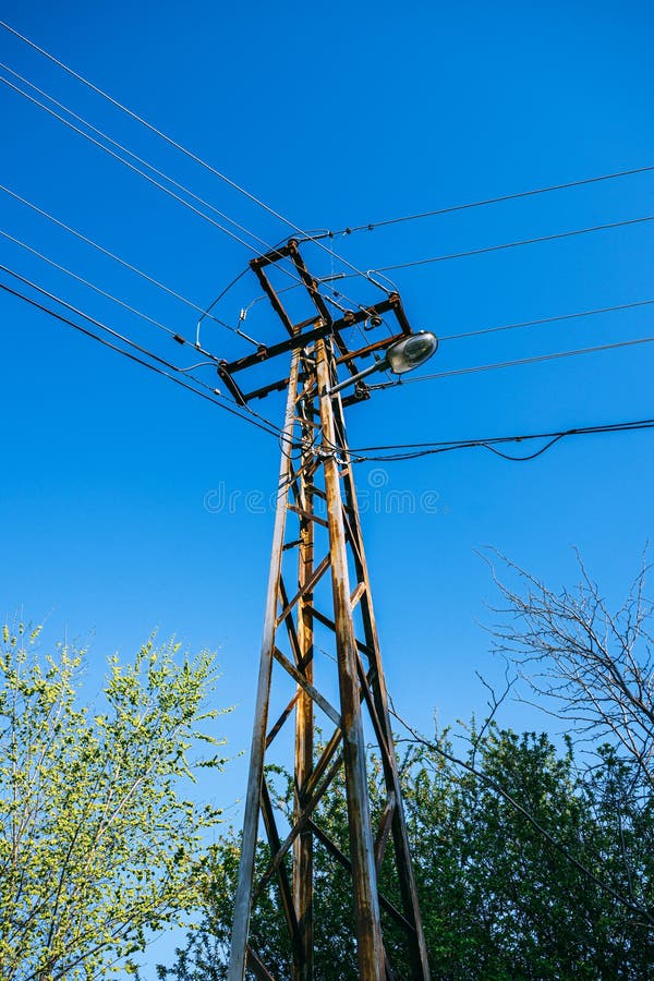 Old Metallic Lamp Post with Street Light and Messy Electrical Wires ...