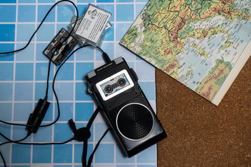 Old Micro Cassette Recorder with Its Mic and Several Cassettes Next To ...