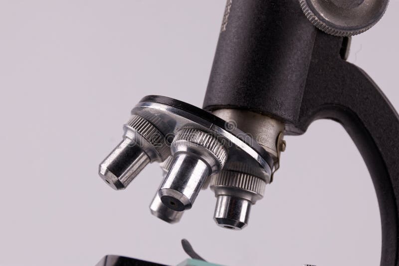 An Old Microscope Stands Isolated on a White Surface Stock Image ...