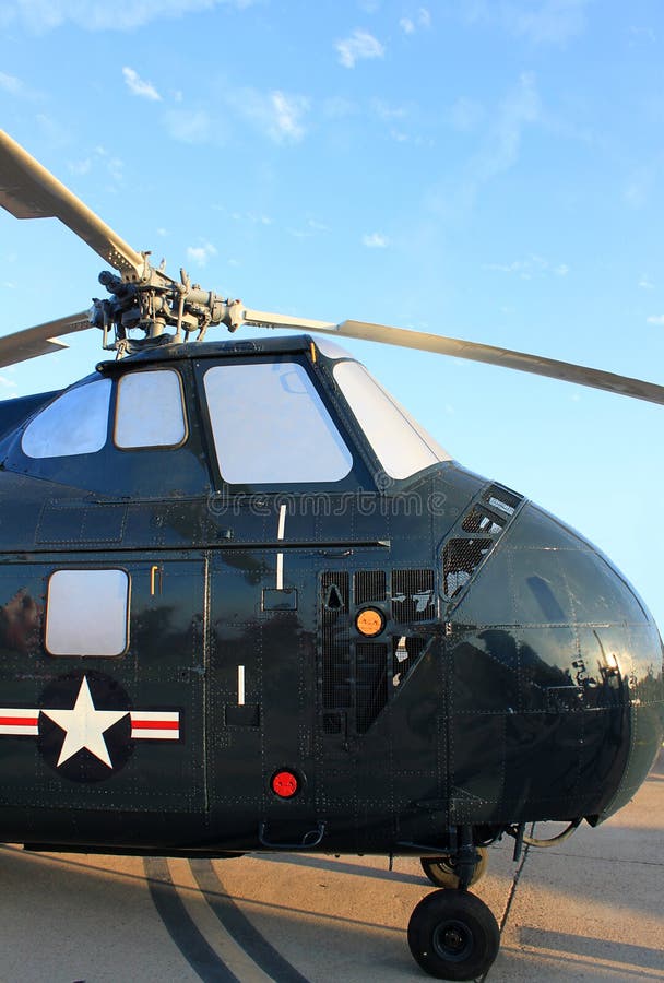 Old military helicopter stock image. Image of blades - 16411407
