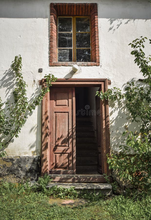 Old mill door and window stock photo. Image of mill - 160761954