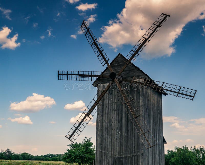 An Old Mill Stands Outside the City Stock Photo - Image of fence, rusty ...