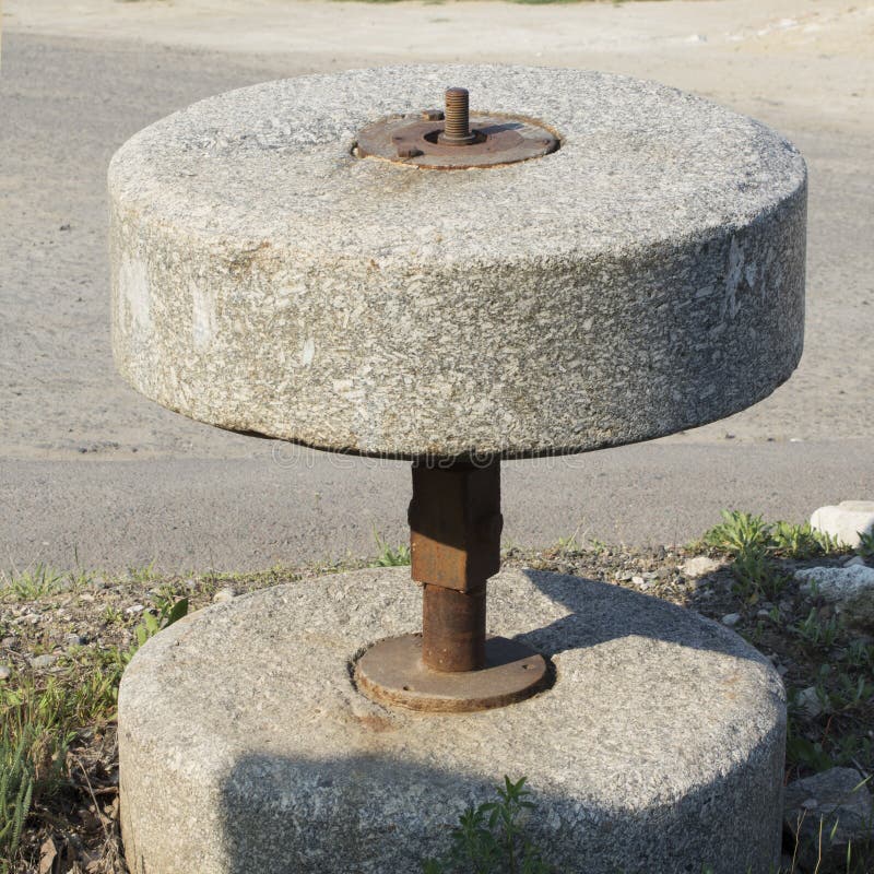 Old millstone for the mill stock photo. Image of grinder - 183675238