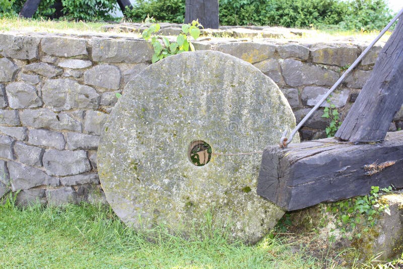 Old millstone stock image. Image of wall, food, historic - 88983059