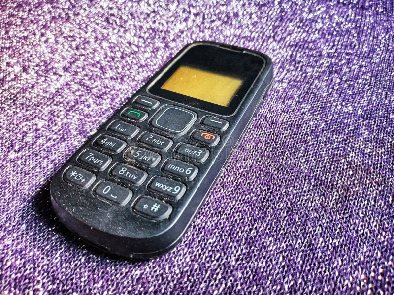 Old Mobile Phone with Texting or SMS Button Keyboard or Keypad on ...