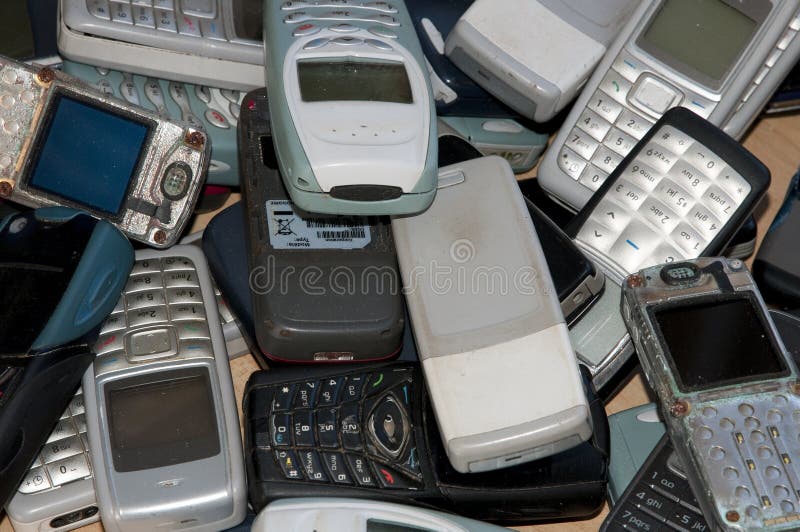Old Mobile Phones Graveyard Stock Image - Image of corrosion, white ...