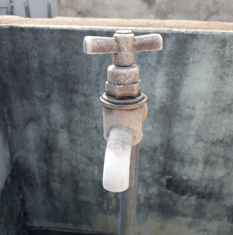 The old model water tap. stock photo. Image of sculpture - 313046086