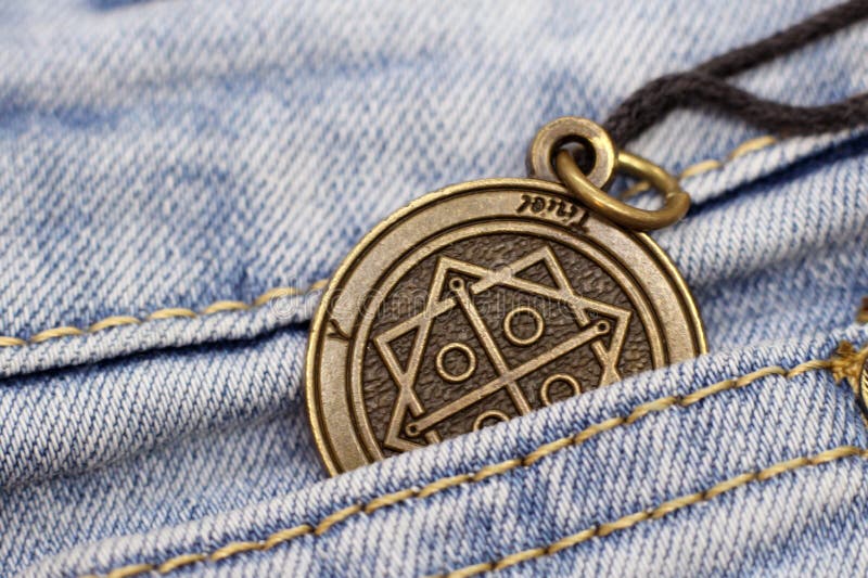Old Money Talisman and Blue Jeans so Close Stock Photo - Image of ...
