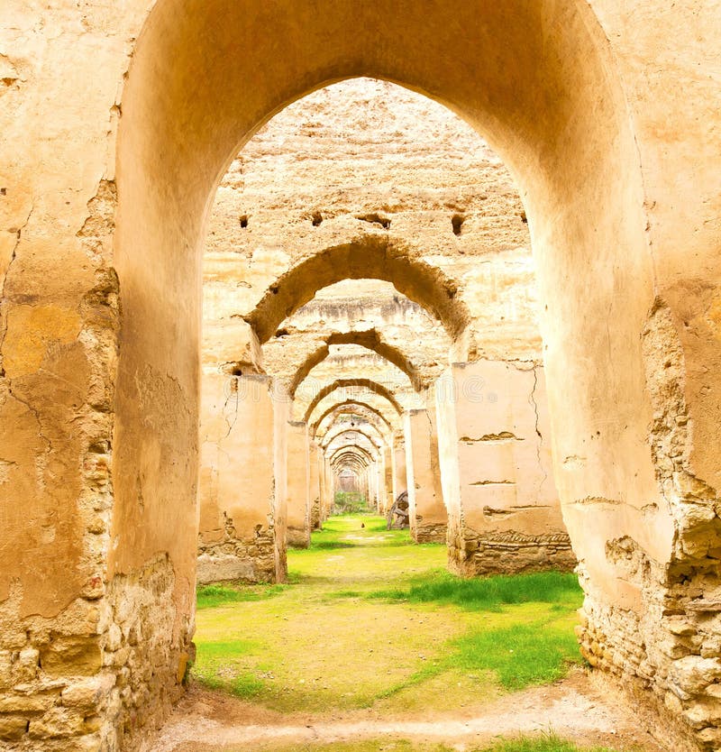 Old Moro Ccan Granary in the Green Grass and Archway Wall Stock Image ...
